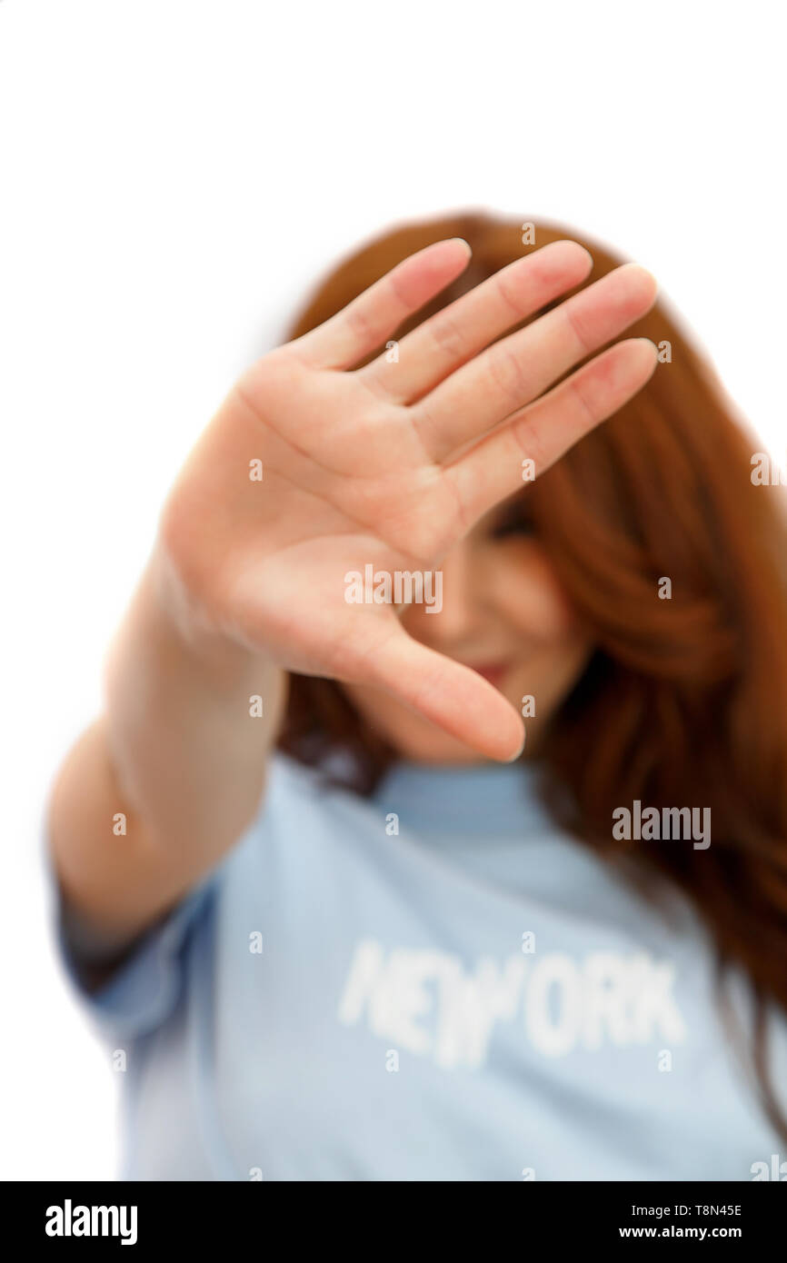 woman on white isolated background makes hand stop Stock Photo - Alamy