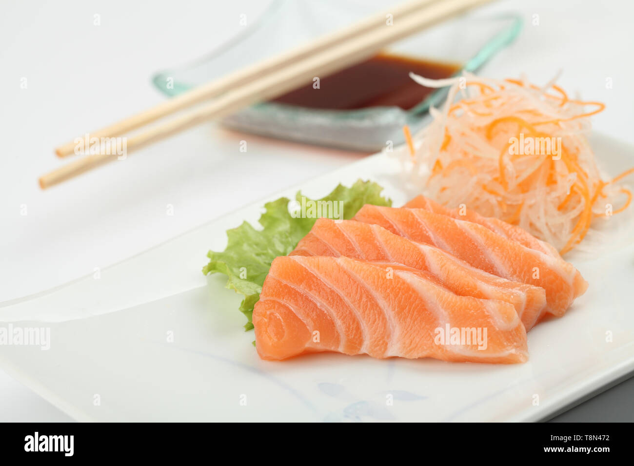 salmon sashimi isolated in white background Stock Photo - Alamy
