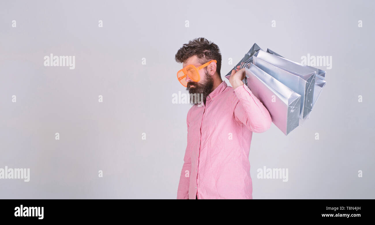Buying things you do not need hi-res stock photography and images - Alamy
