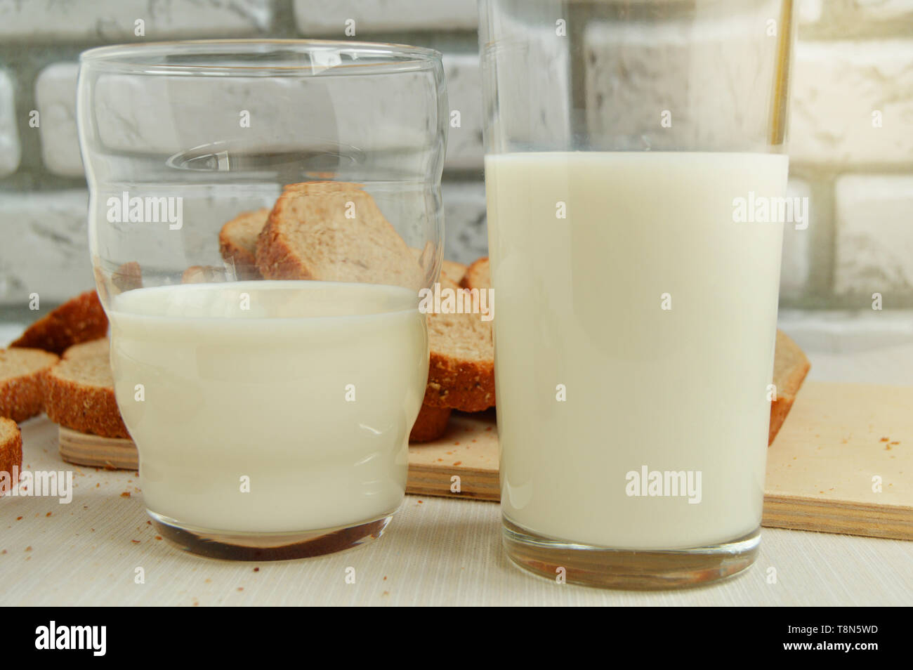 Two glasses of milk are on the table, Breakfast for the family, healthy ...