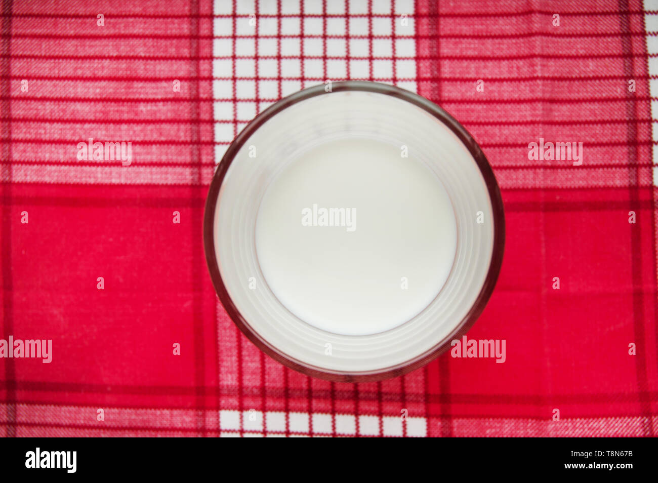 Glass of milk on checkered cloth hi-res stock photography and images ...