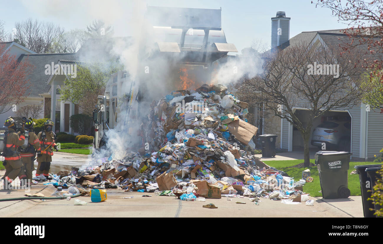 Garbage Truck fire in condominium complex during rubbish pickup Stock ...