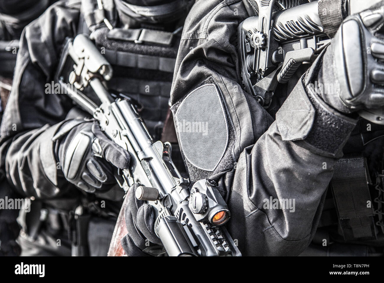 SWAT team fighters ready to arrest danger criminal Stock Photo - Alamy
