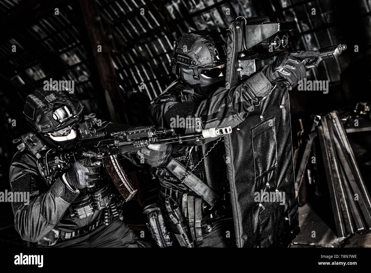 Police special reaction team squad attacking criminals Stock Photo - Alamy