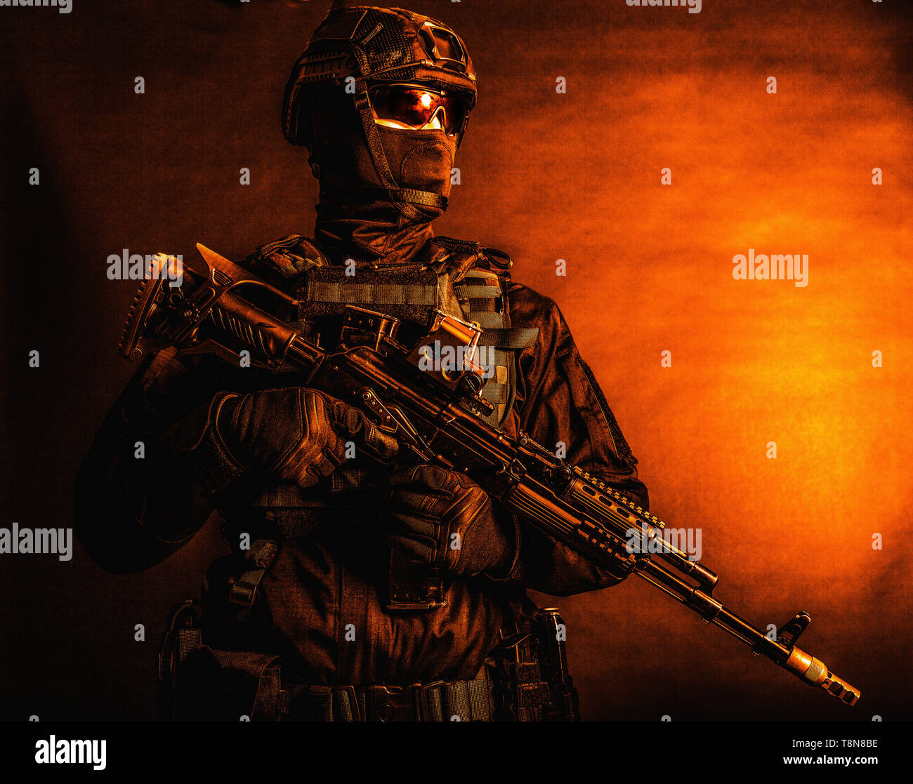 Special forces soldier posing with service rifle Stock Photo - Alamy