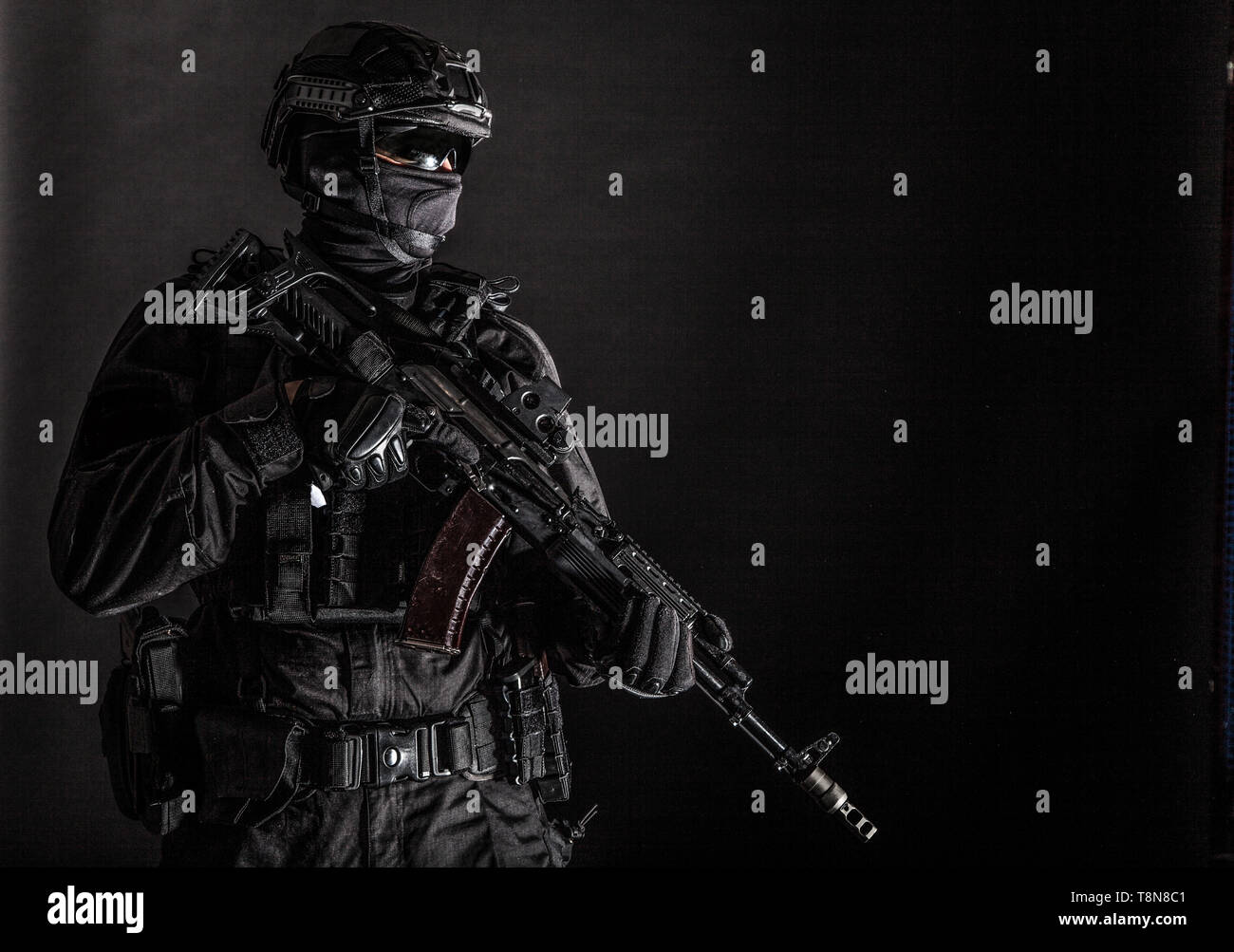 Elite police squad member in tactical ammunition Stock Photo - Alamy