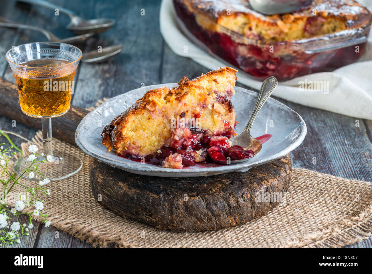 Cherry and almond bakewell sponge pudding Stock Photo - Alamy