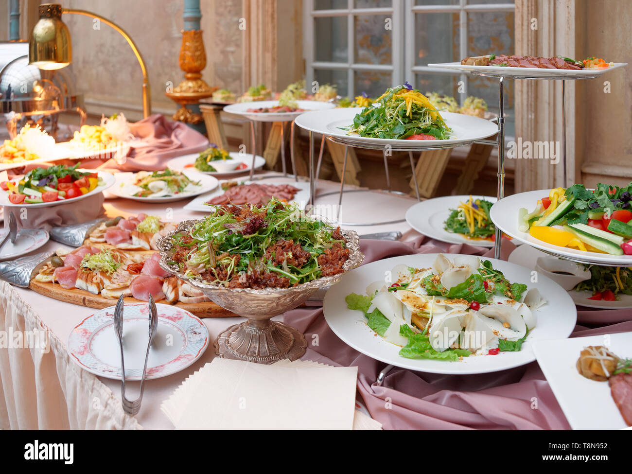 Catering table full of food, no people Stock Photo - Alamy