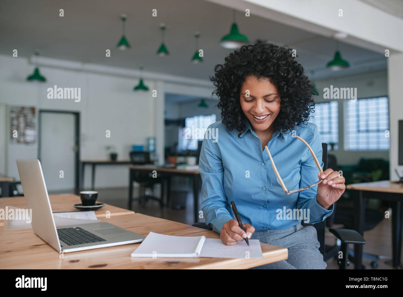 Businesswoman work laptop writing hi-res stock photography and images ...