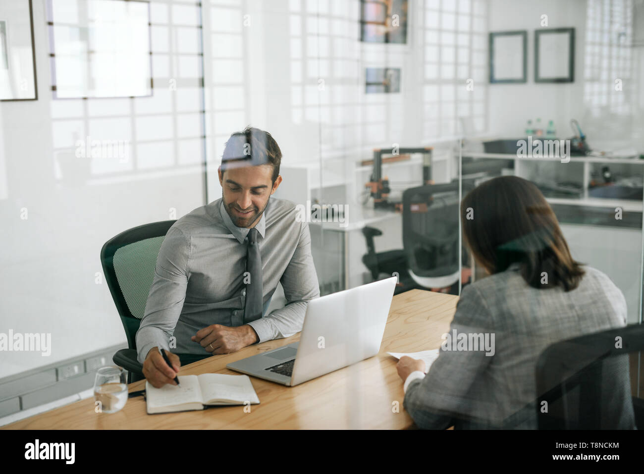 Interviewer taking notes hi-res stock photography and images - Alamy