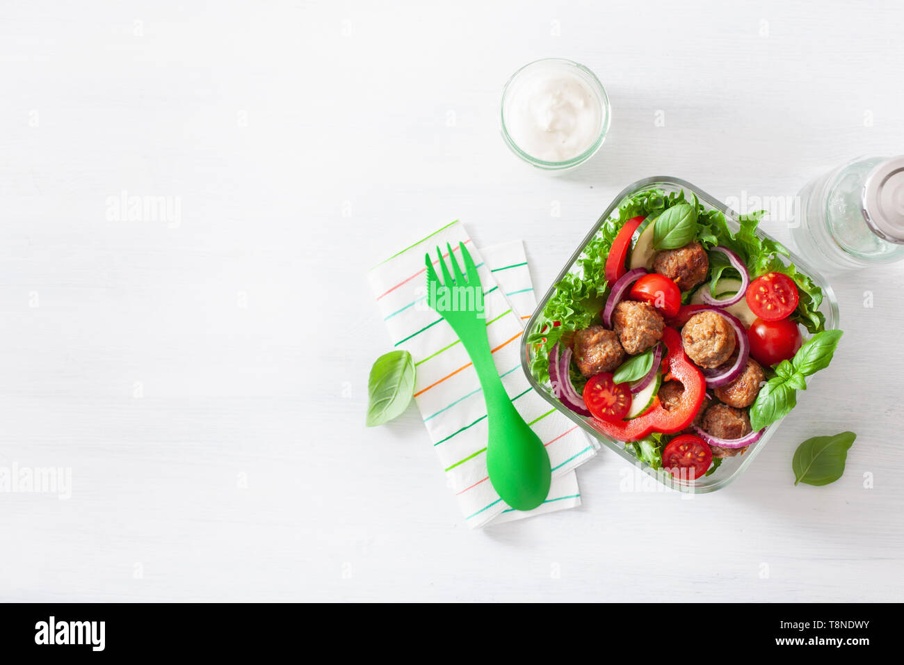 keto paleo lunch box with meatballs, lettuce, tomato, cucumber, bell ...