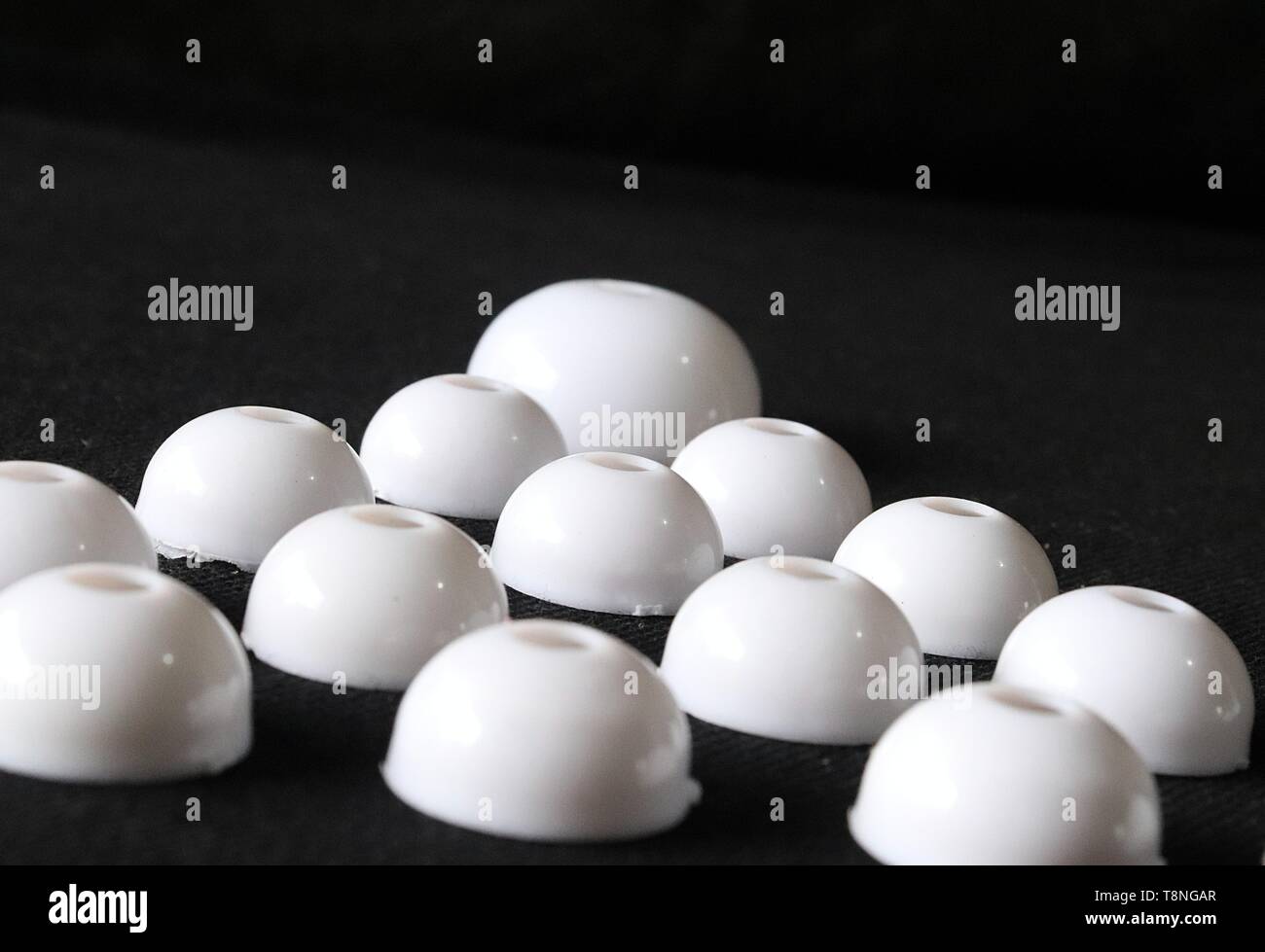 This is an Conceptual image of team explained using plastic domes. The ...
