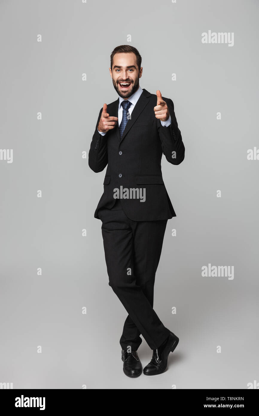 Man pointing suit isolated full length hi-res stock photography and ...