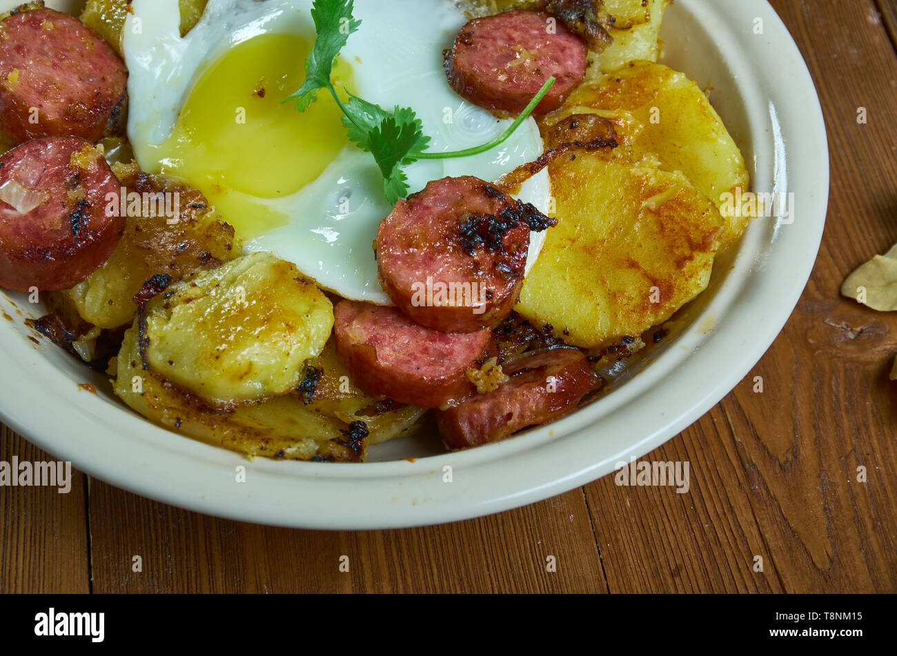 Tiroler Grostl, fried potatoes , bacon and onion. Austrian national ...