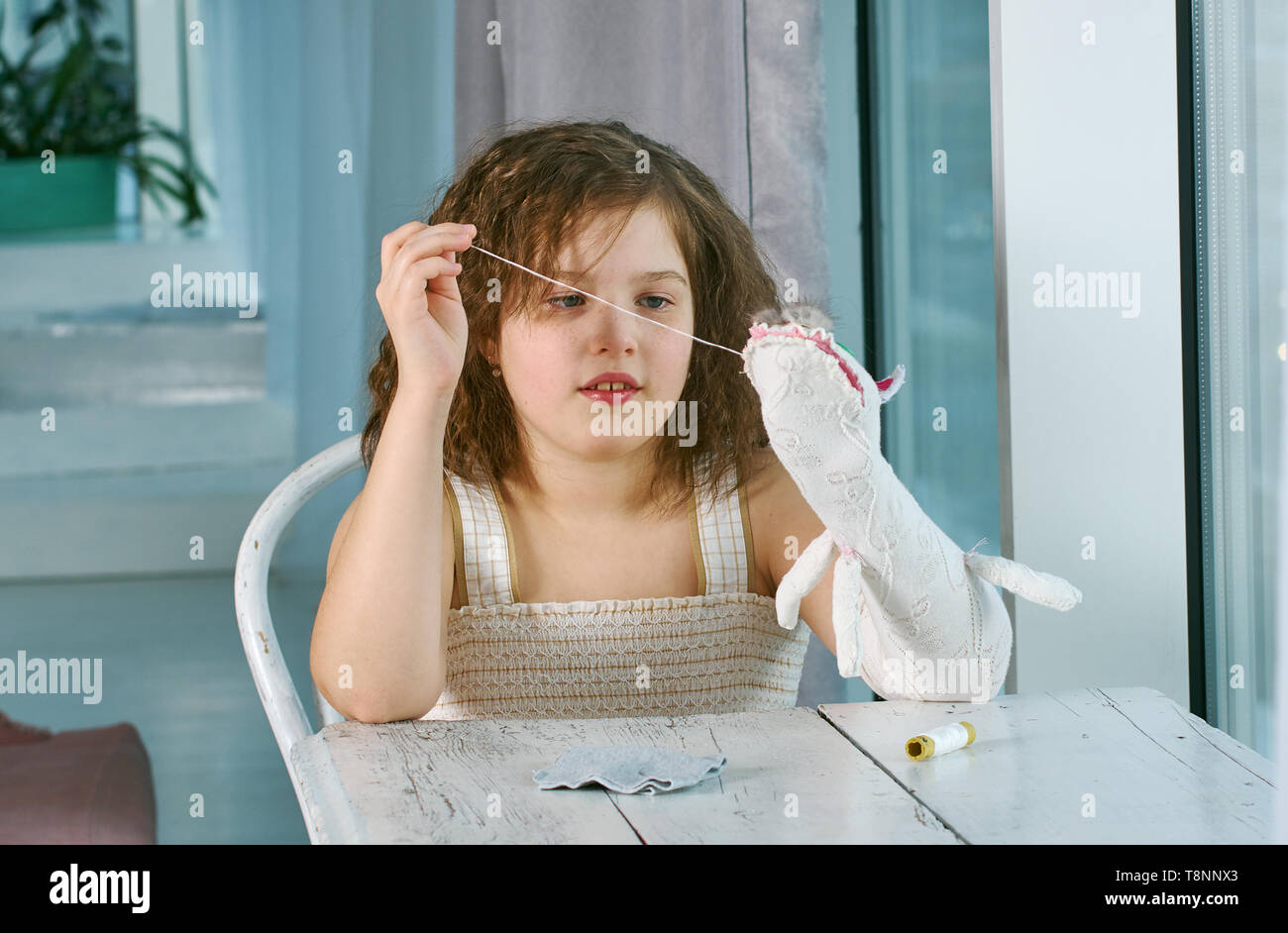 small girls expression playing with hand puppets Stock Photo - Alamy
