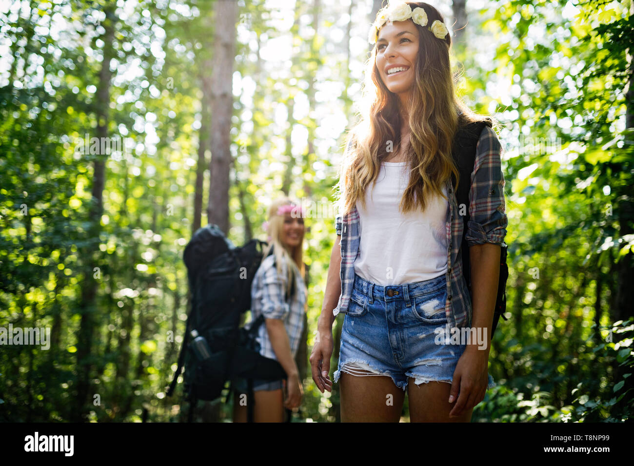 Girl backpacker walking on forest hi-res stock photography and images ...