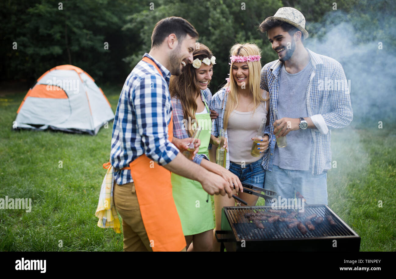Friends having fun barbecue party hi-res stock photography and images ...