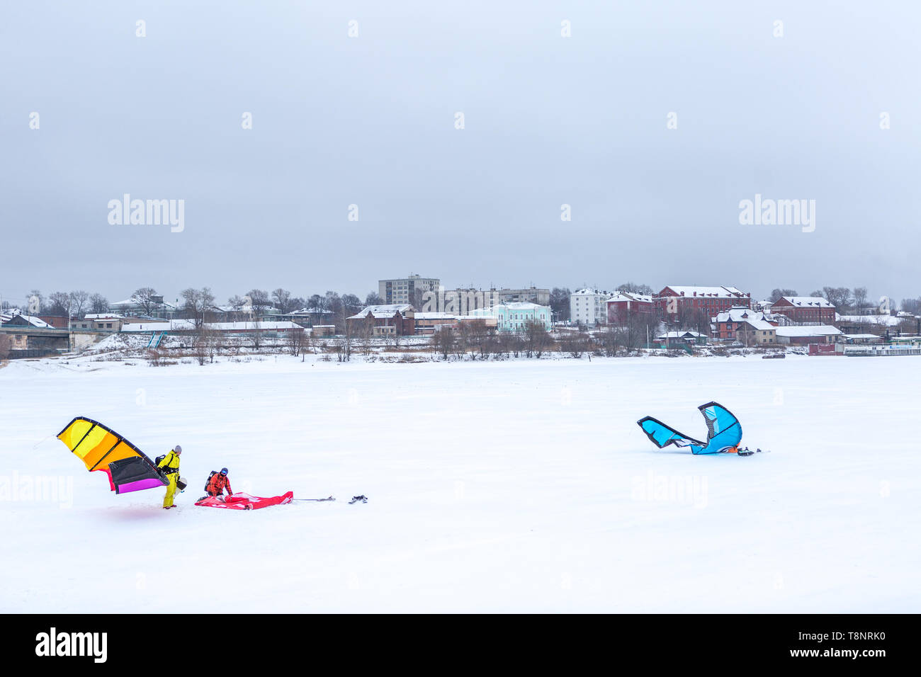 The athletes in the winter is preparing a kites for Snowkiting Stock ...