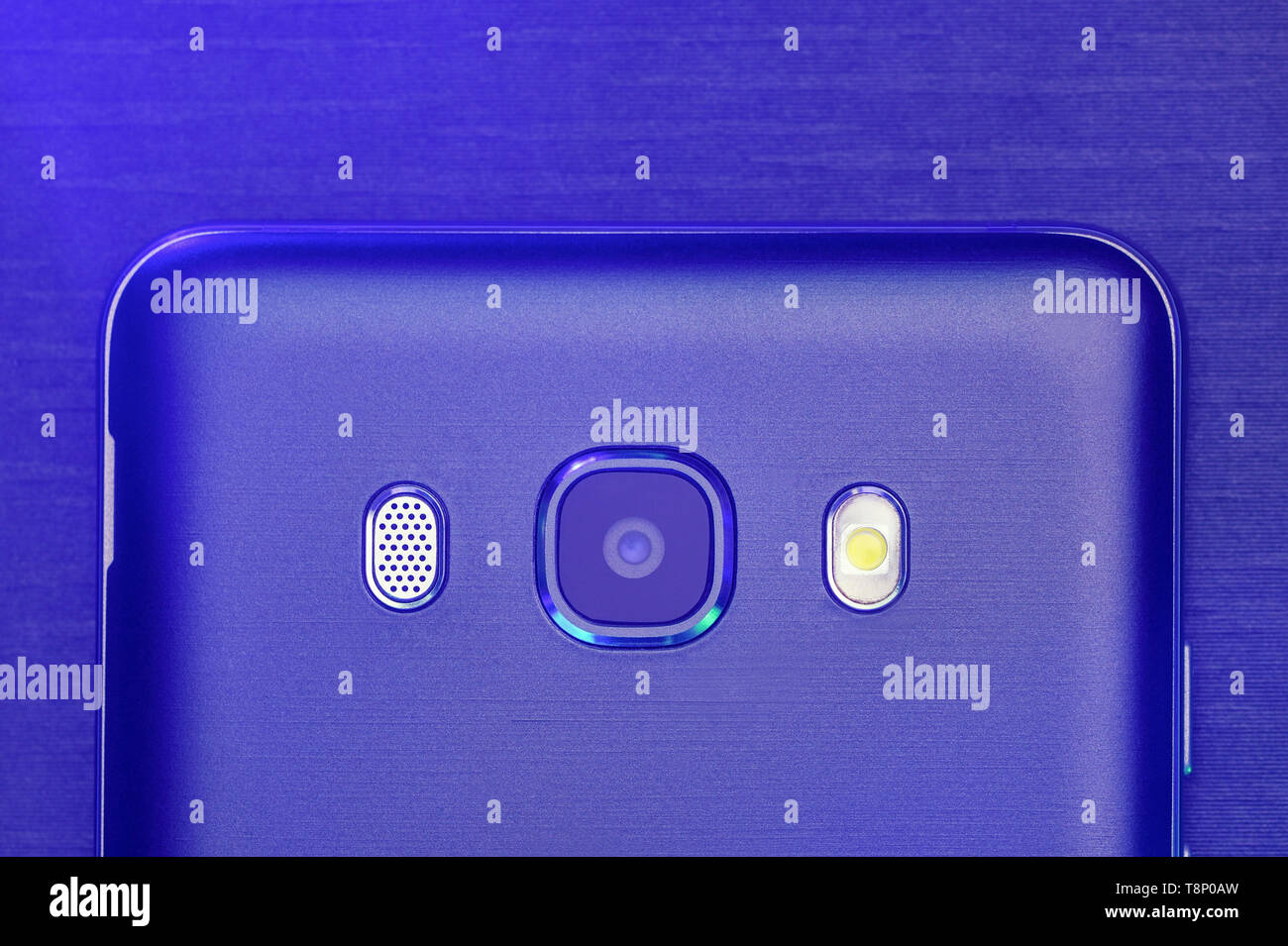 Close-up view of the top of the black smartphone on the camera and ...