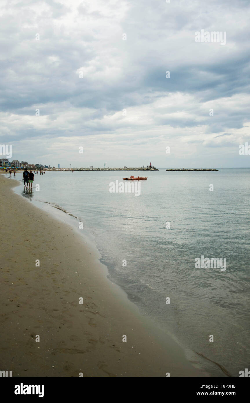 People walking at the beach Stock Photo - Alamy