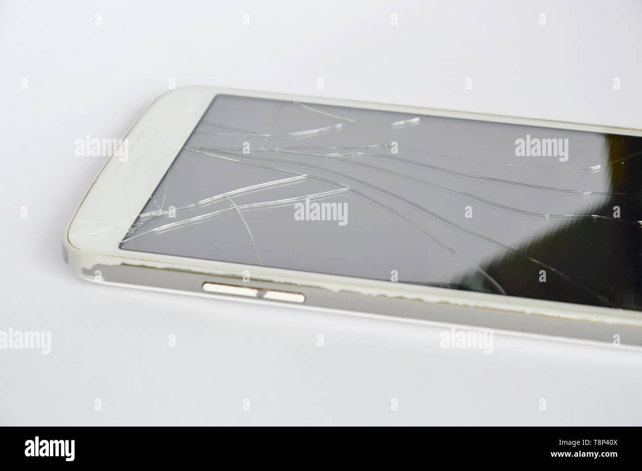 broken touch screen of white smart phone Stock Photo - Alamy