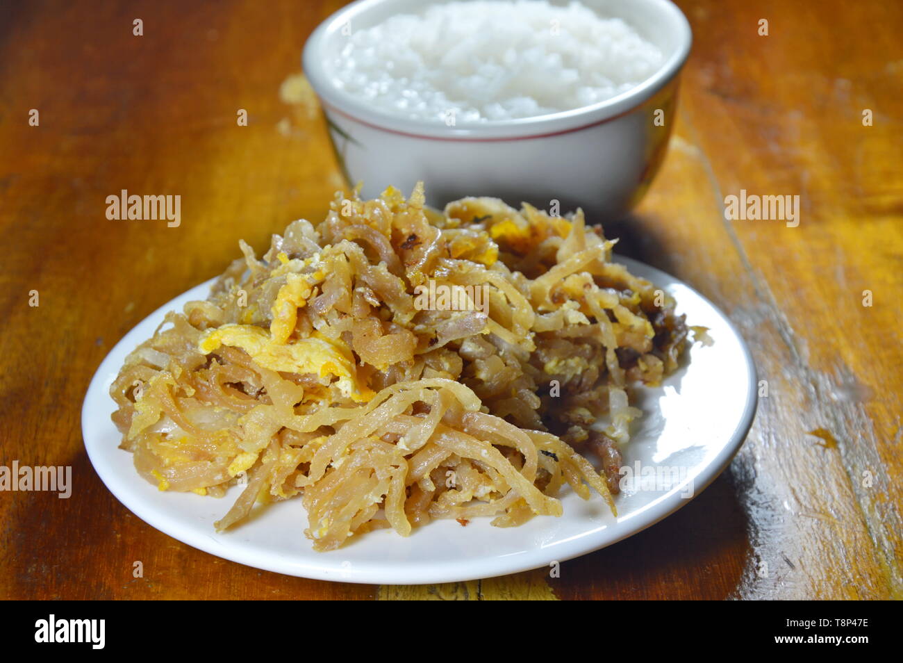 stir fried sweet pickled radish with egg and rice porridge Stock Photo ...