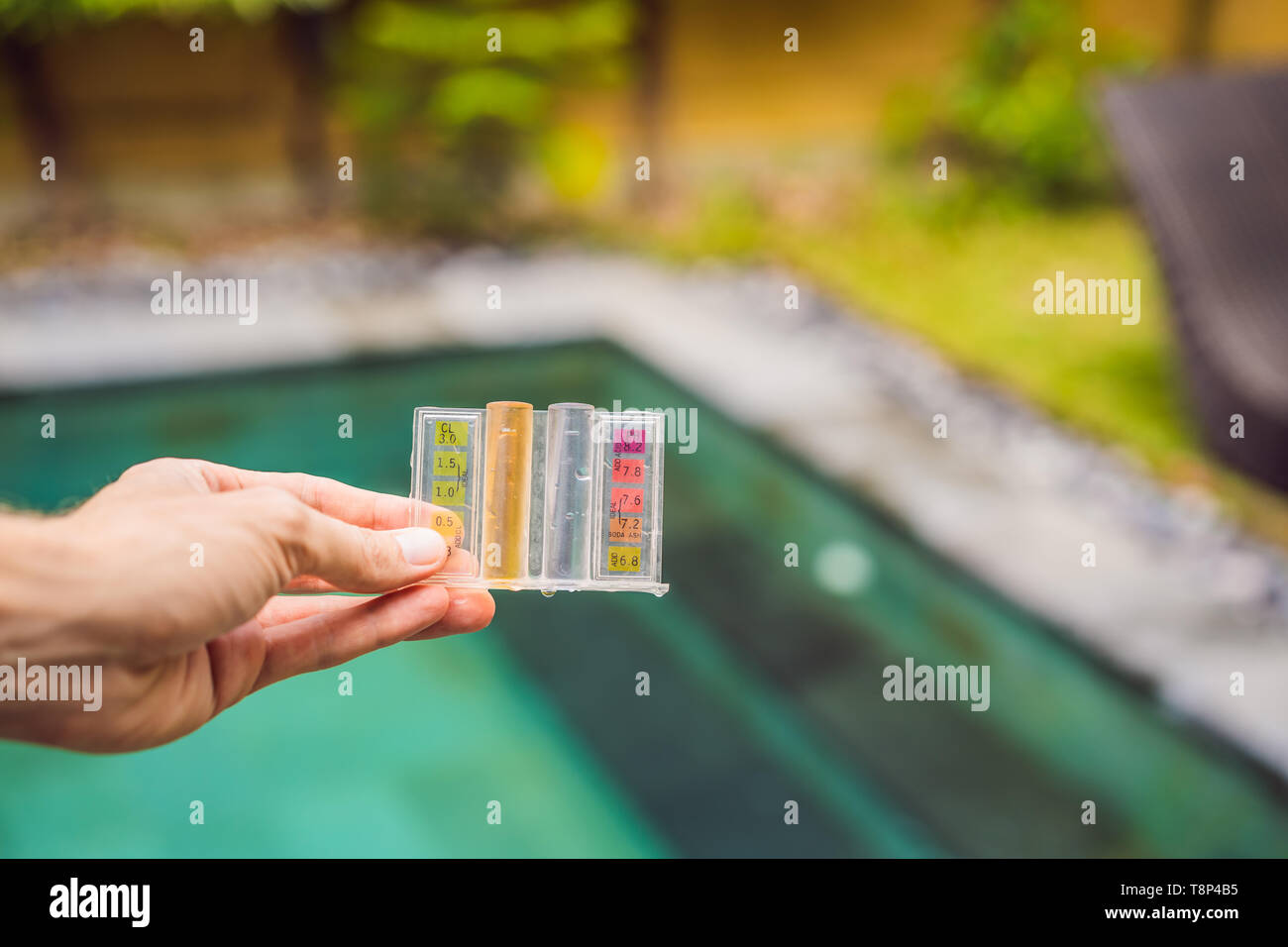Measurement of chlorine and PH of a pool Stock Photo - Alamy