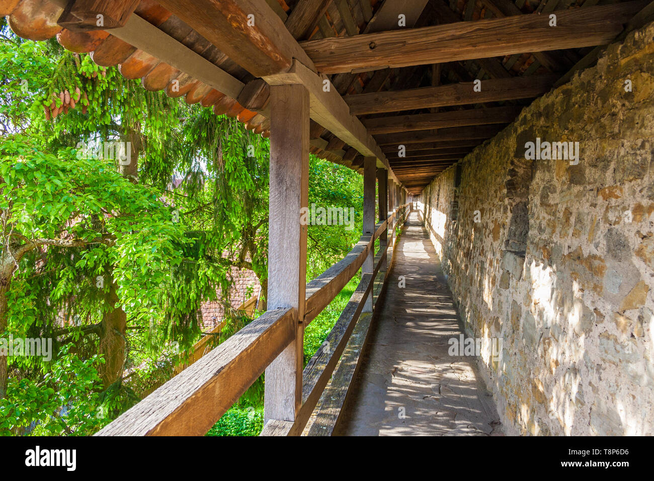 Perfect view of the roofed defensive corridor with wooden railings ...
