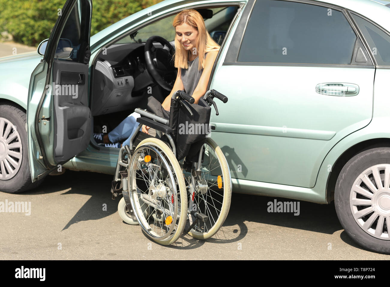 Female driver getting out car hi-res stock photography and images - Alamy