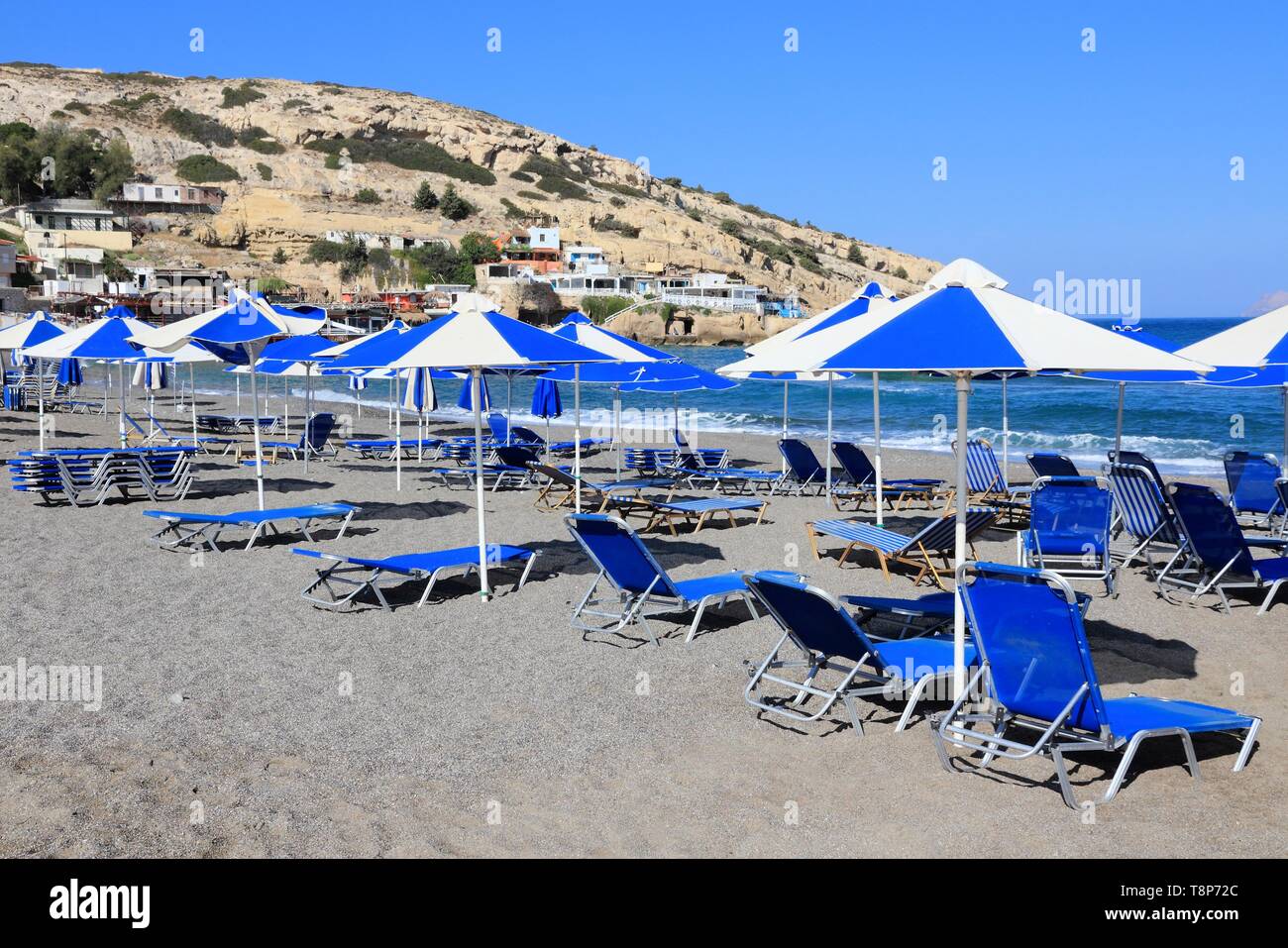 Matala, Crete - beach view with the town in background Stock Photo - Alamy