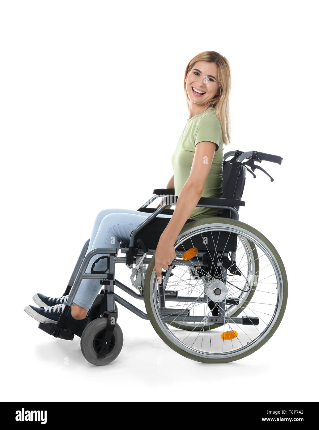 Beautiful woman in wheelchair on white background Stock Photo - Alamy