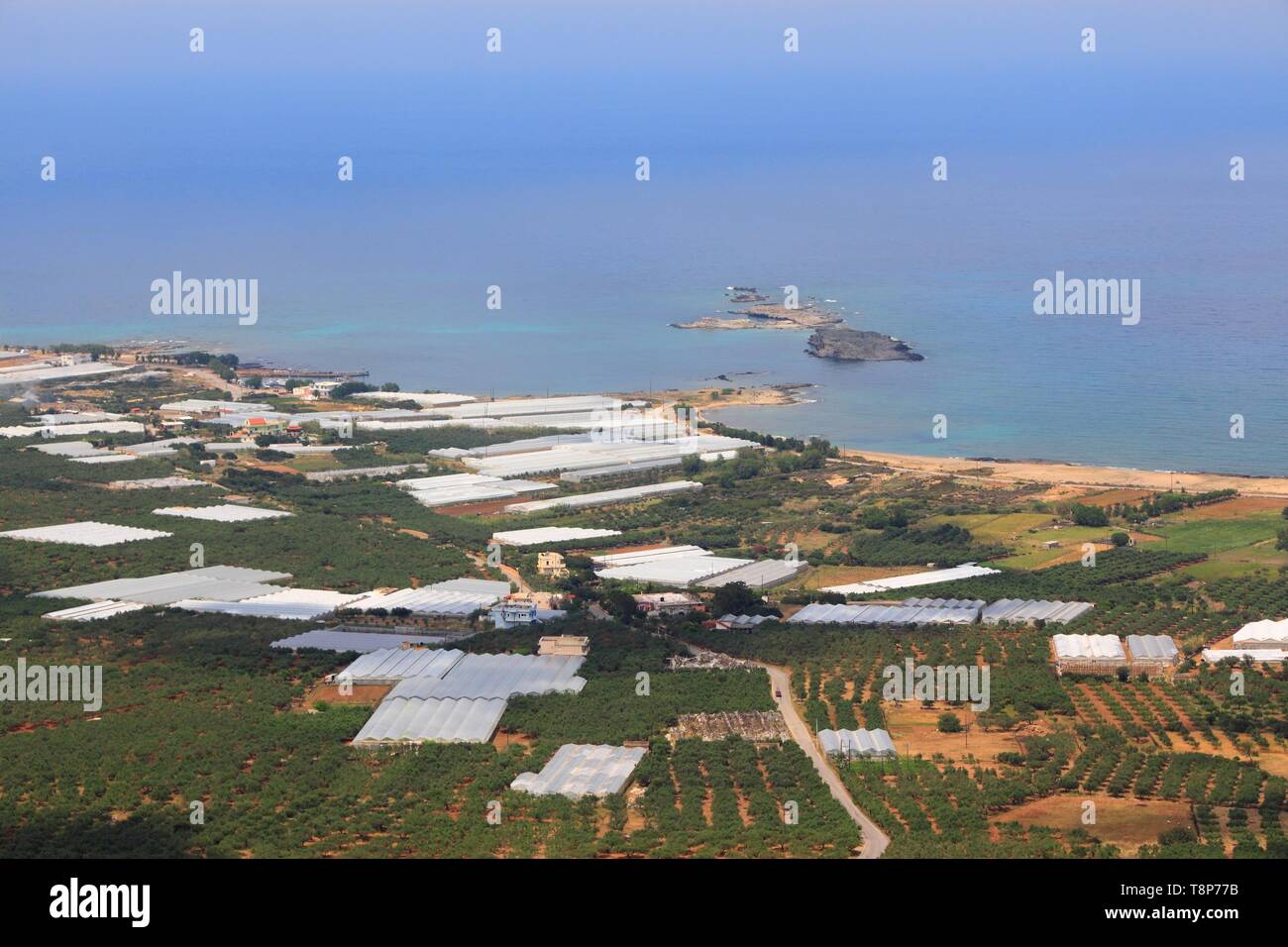 Greenhouse farming landscape of Crete island in Greece. Agriculture ...
