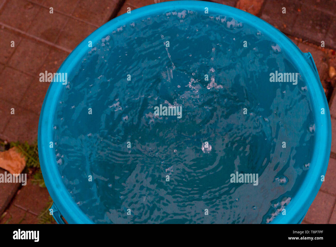 Water dripping into bucket hi-res stock photography and images - Alamy