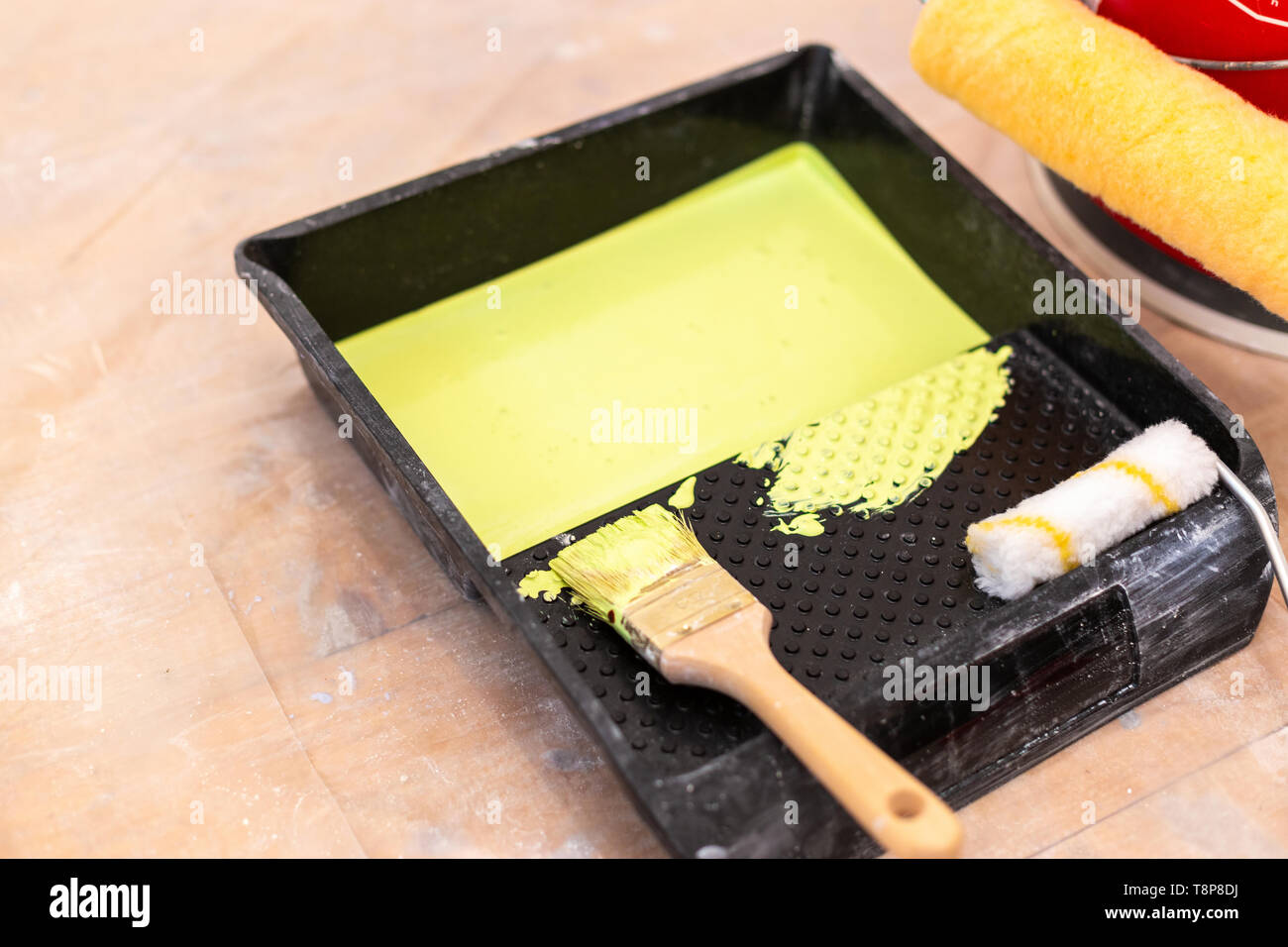 Set of instruments for painting wall Stock Photo - Alamy