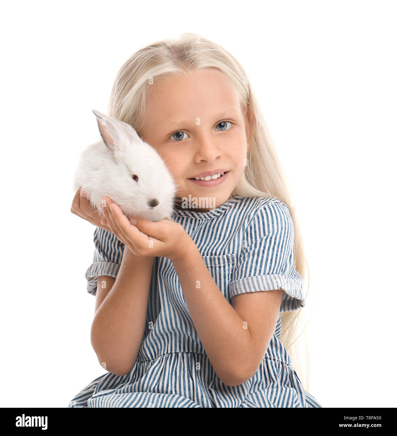 Little girl with cute rabbit on white background Stock Photo - Alamy