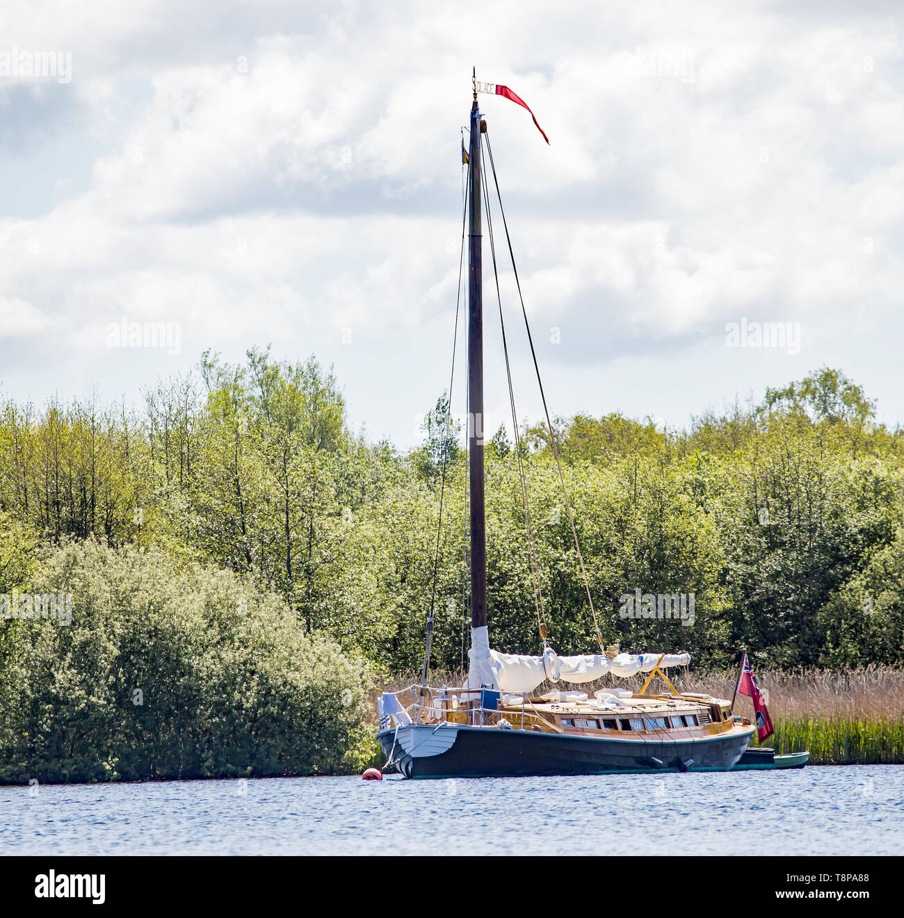 A traditional Norfolk wherry named Solace moored up on Wroxham Broad ...