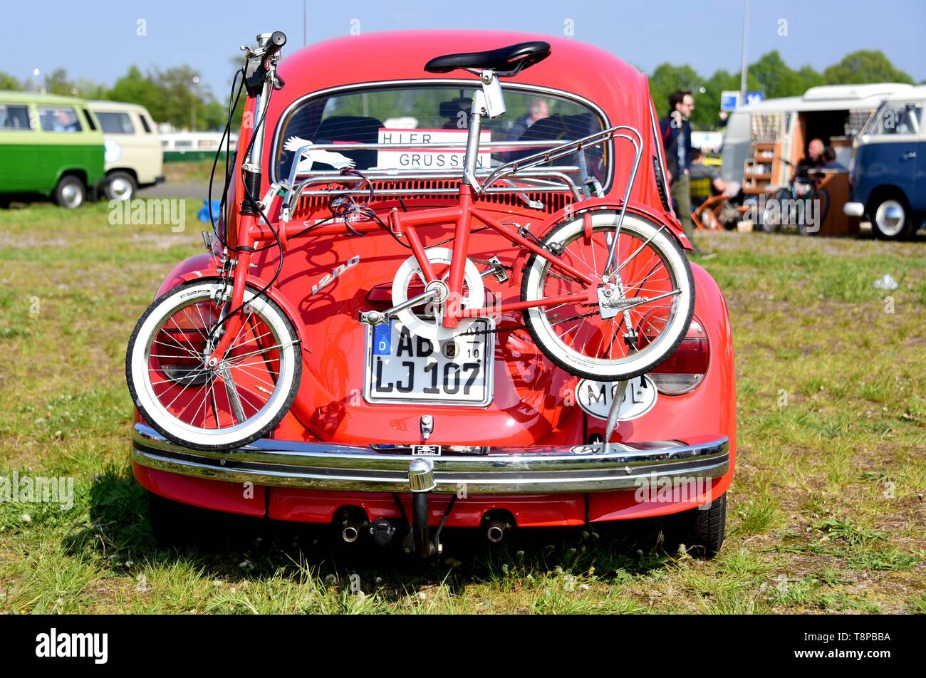 A Volkswagen Beetle with a bike on it at the Maikaefertreffen (May ...