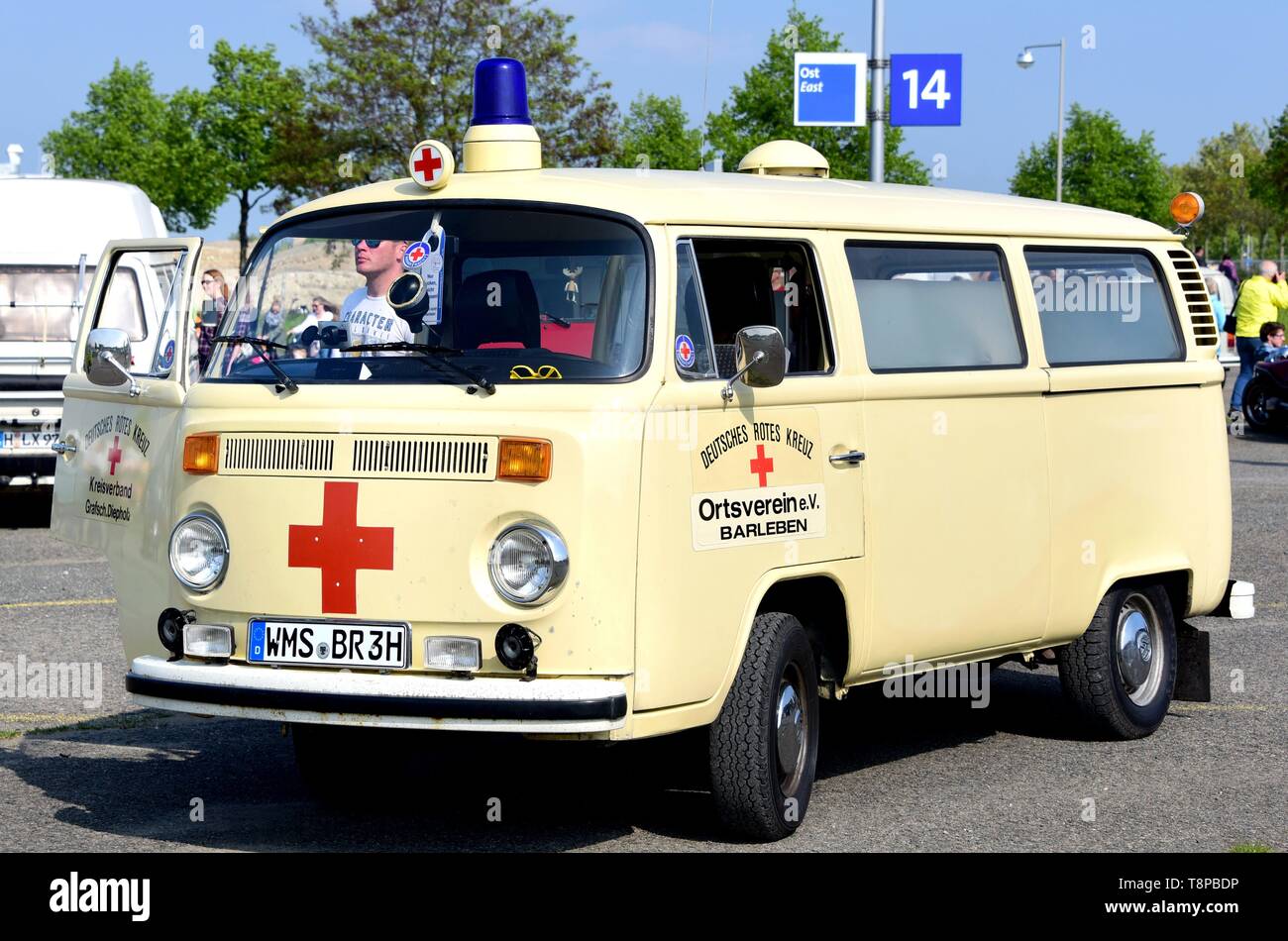 A VW T2 with the logo of the German Red Cross on it at the ...