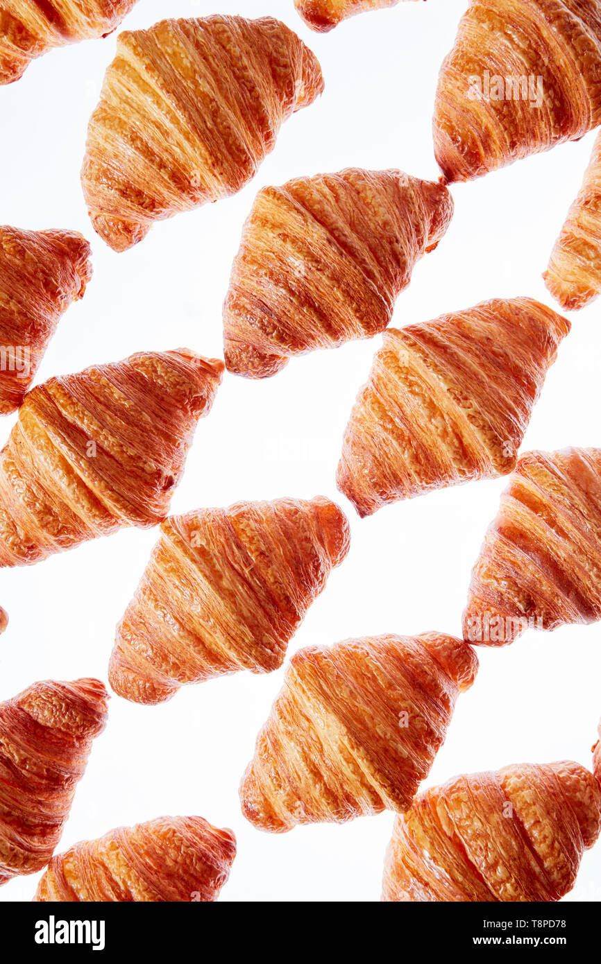 Diagonal baked goods pattern on a light background Stock Photo - Alamy