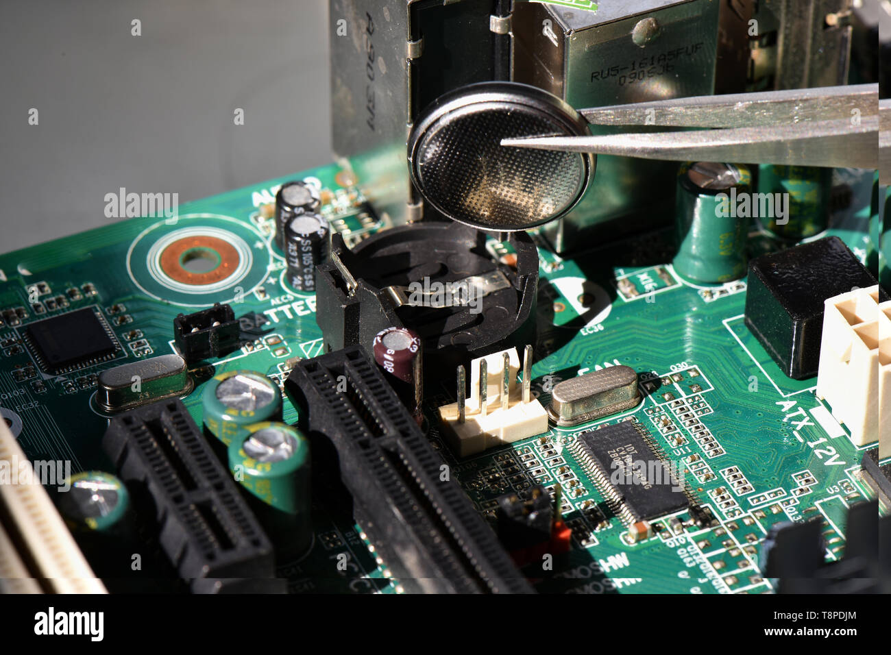 Repairing Damaged electronic components Repairing and service concept ...
