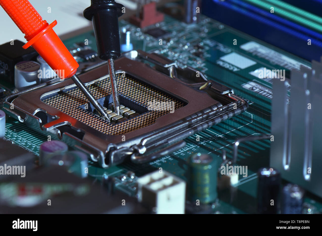 Close up needle tipped tip multimeter checking service repairing cpu ...