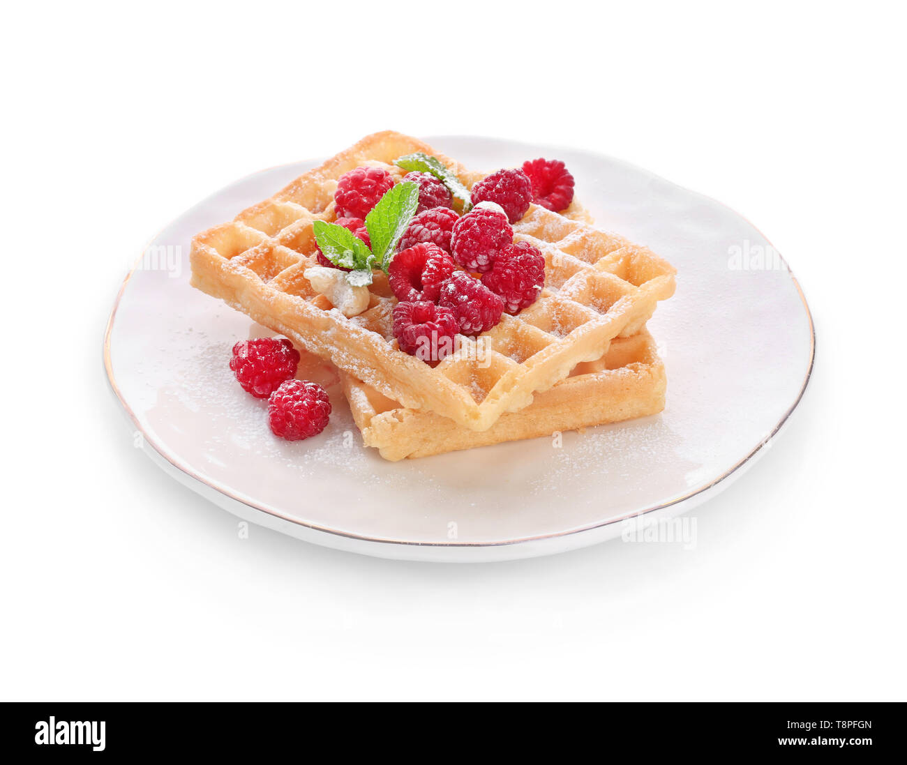 Waffles with powder and raspberries hi-res stock photography and images ...