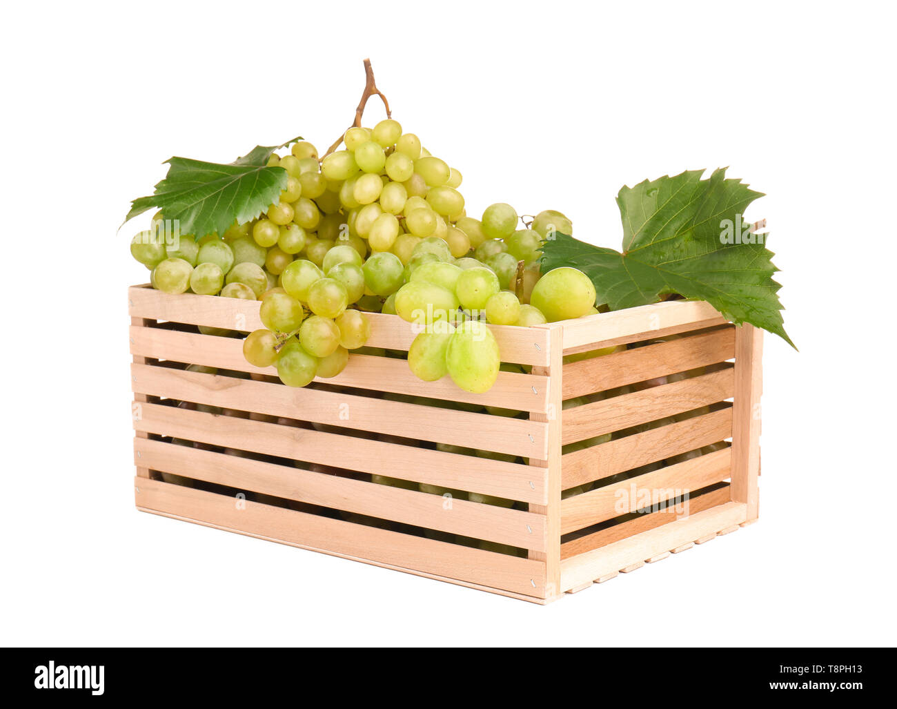 Wooden crate with ripe sweet grapes on white background Stock Photo - Alamy