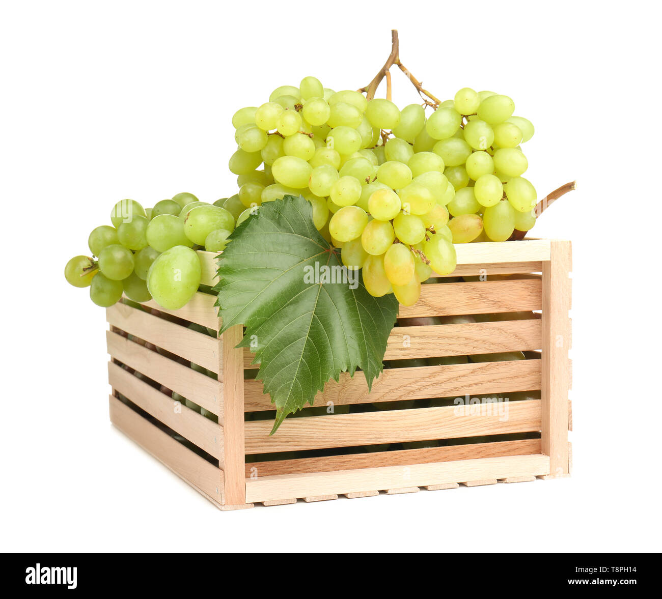 Wooden crate with ripe sweet grapes on white background Stock Photo - Alamy