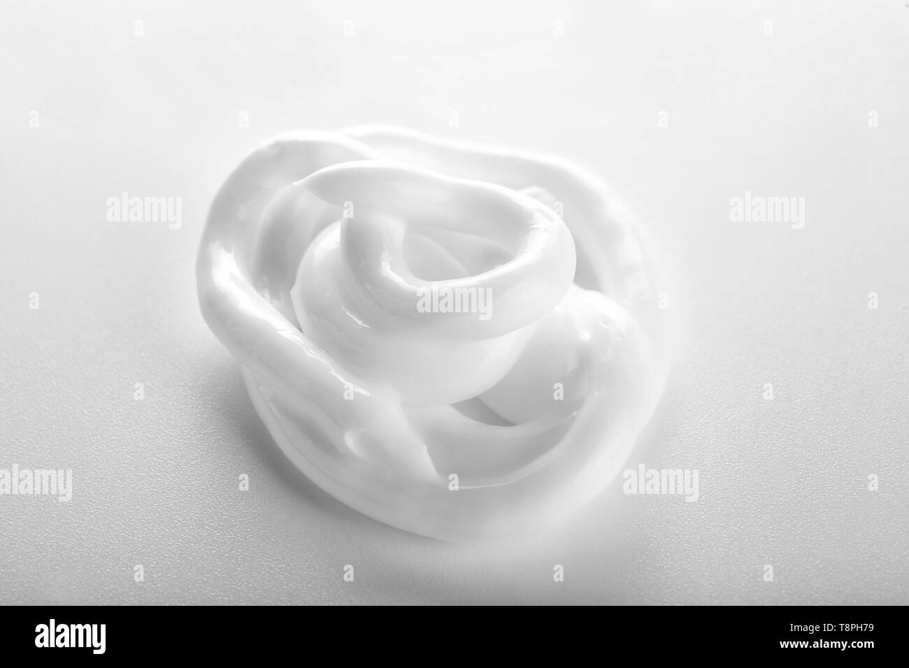 Body cream on white background Stock Photo - Alamy