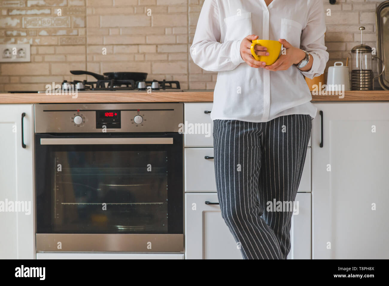 No breakfast and kitchen and woman hi-res stock photography and images ...