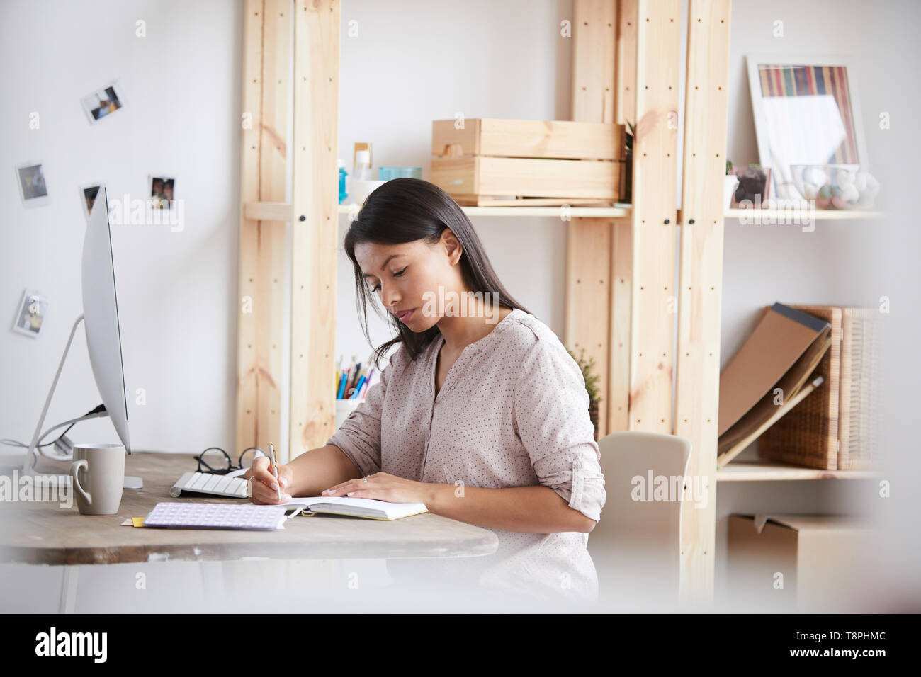 Beautiful office girl taking notes hi-res stock photography and images ...