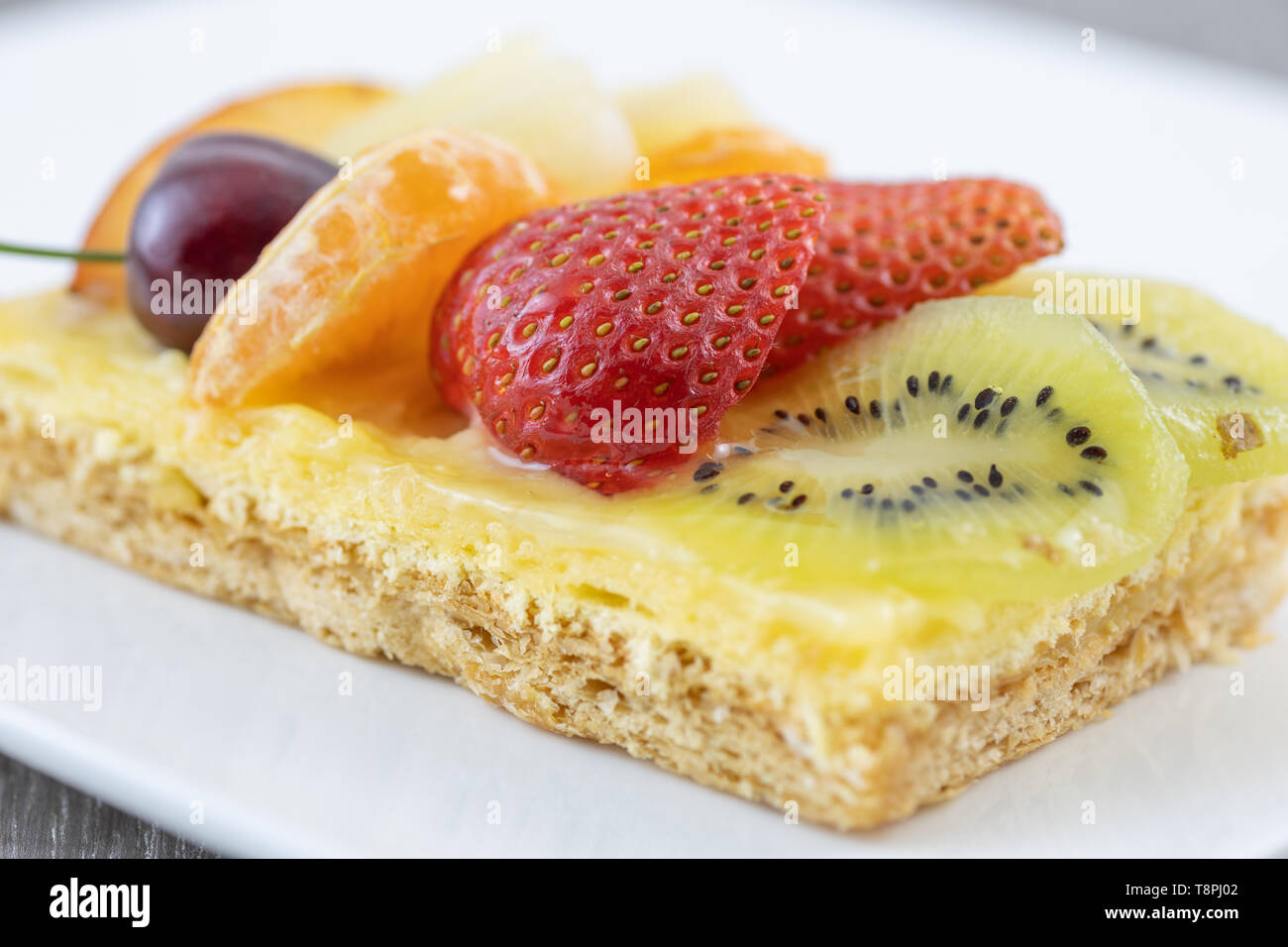 Puff pastry tart and seasonal fruits Stock Photo - Alamy