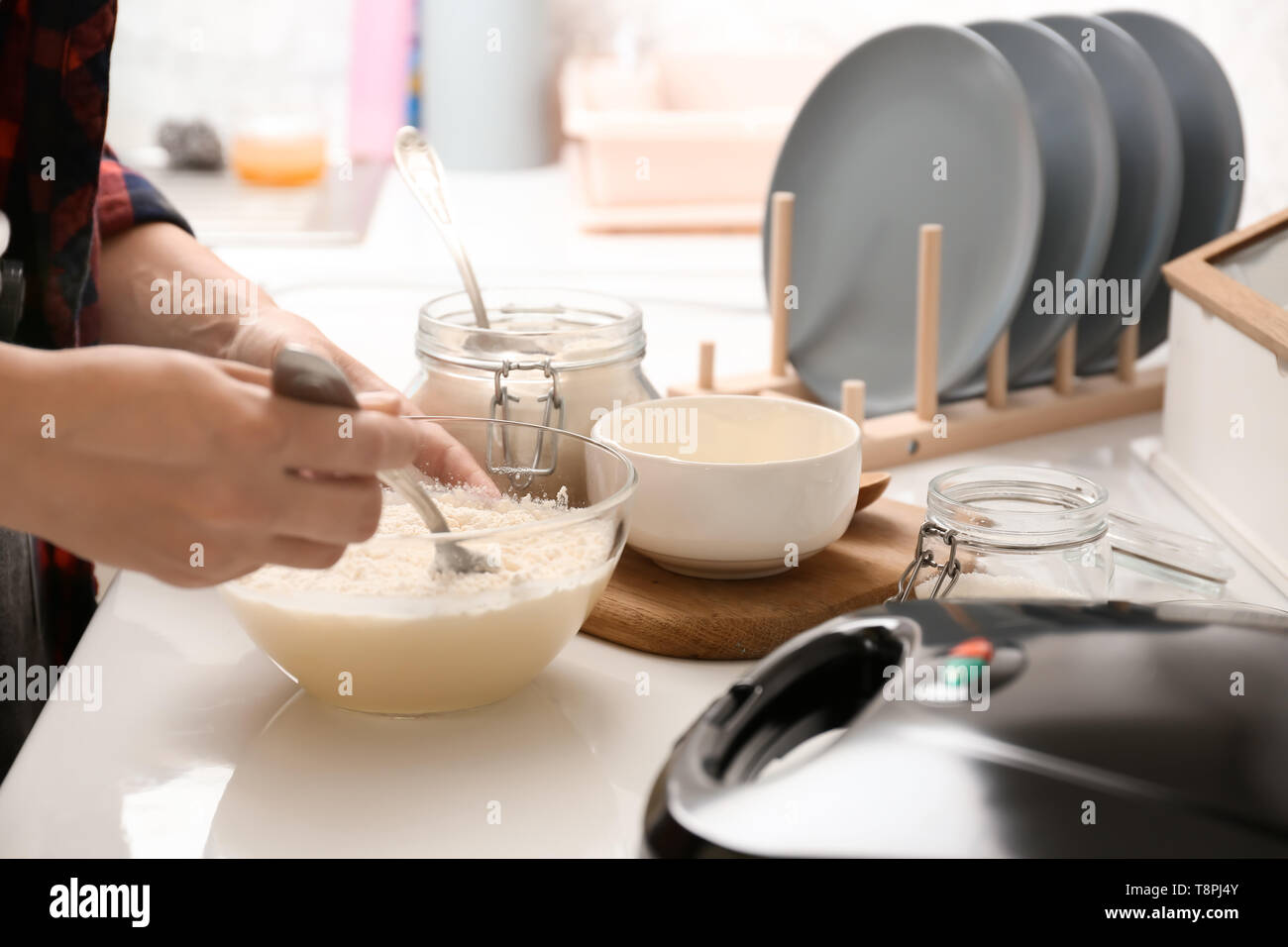 Dough waffles in waffle iron hi-res stock photography and images - Alamy