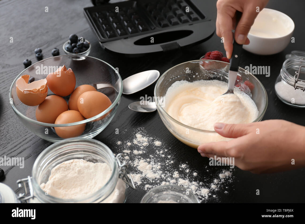 Black woman mixing baking hi-res stock photography and images - Alamy
